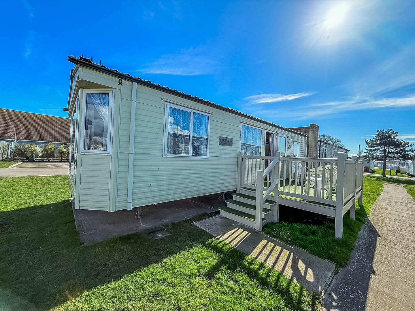 17071P – Pines area, 2 bed, 6 berth caravan with side decking, D/G and ...